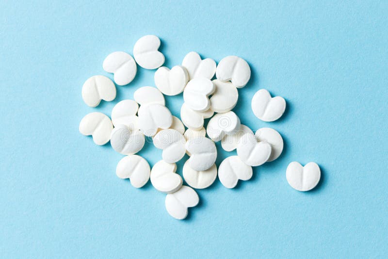 Heart-shaped white pills stock image. Image of shaped - 15437447