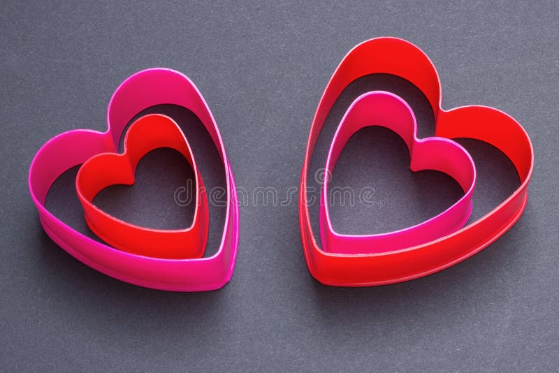 Heart-shaped Plastic Cookie Cutters Inside Another Heart. Love Romantic ...