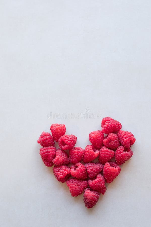 Heart shaped raspberries stock photo. Image of heart - 125591528