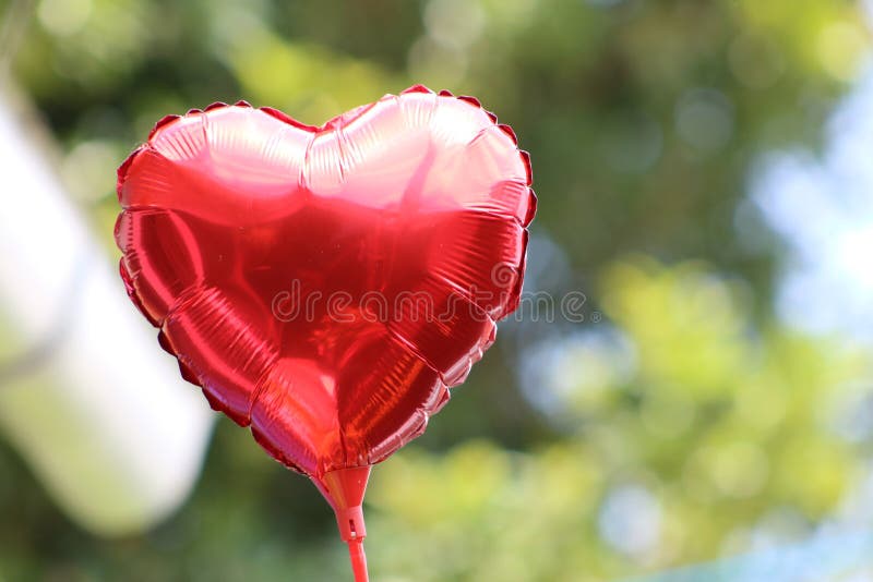 Heart Shaped Red Inflatable Balloon Stock Photo - Image of shaped ...