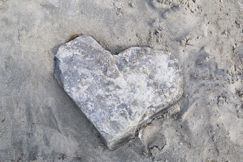 Heart shaped rock on beach stock photo. Image of maine - 25791890