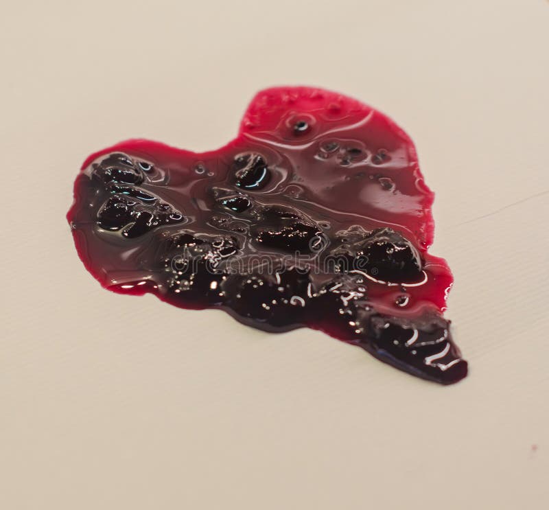 A Heart-shaped Spill of Dark Red Jam on a Light Background Stock Image ...