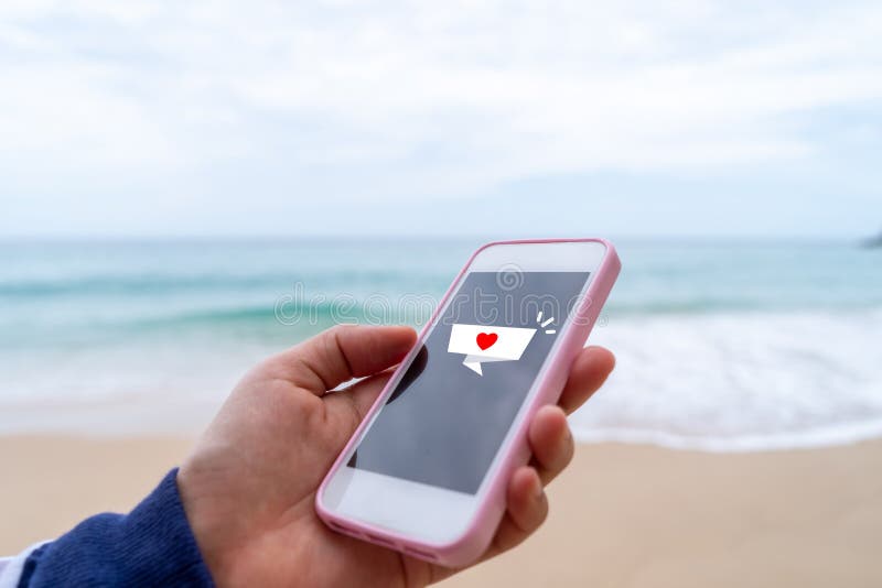 Heart Sign on Chat Box Icon on Smartphone at Summer Beach Technology ...