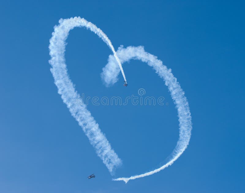 Planes Skywriting Heart stock image. Image of smoke, skywriting - 3745085