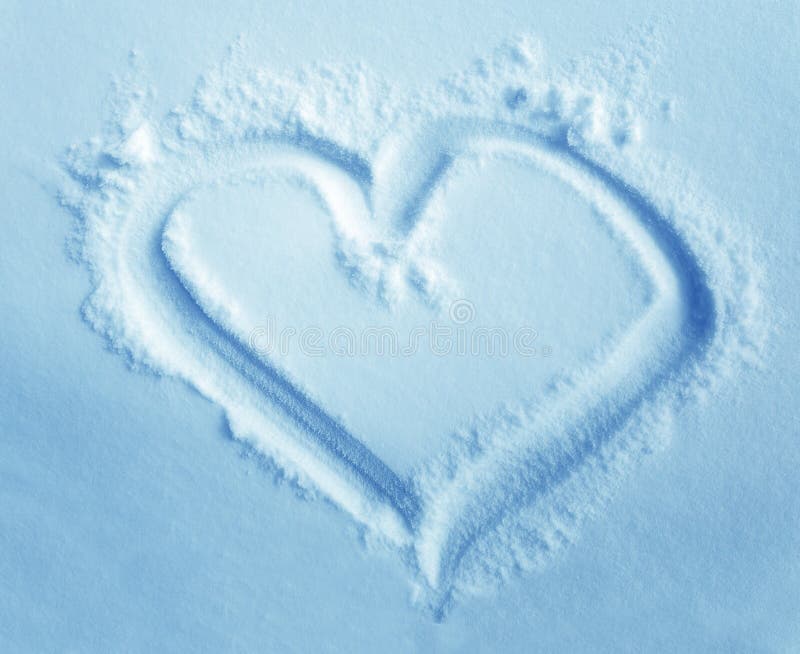 Heart in Snow, Drawing in the Snow. Light Blue Background. Stock Photo ...