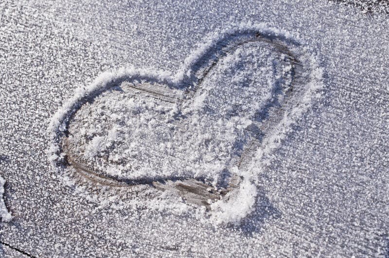 Heart on the snow stock photo. Image of closeup, detail - 102880358