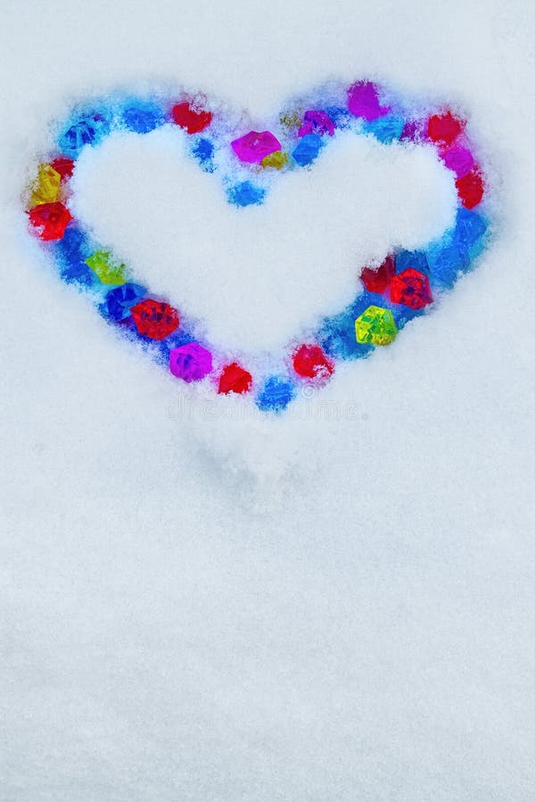 Heart on snow stock photo. Image of multicolored, minimal - 264963522