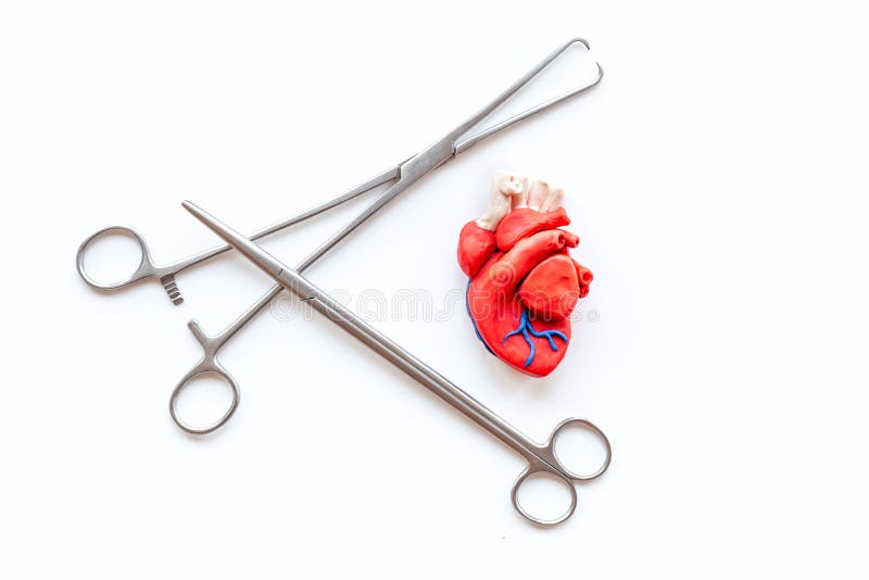 Heart Surgery Concept with Surgical Instruments and Heart Model Made of ...