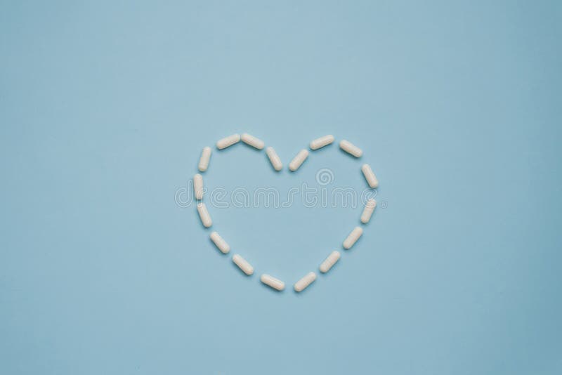 Heart Symbol in the Format of Various Tablets Highlighted on a Blue ...