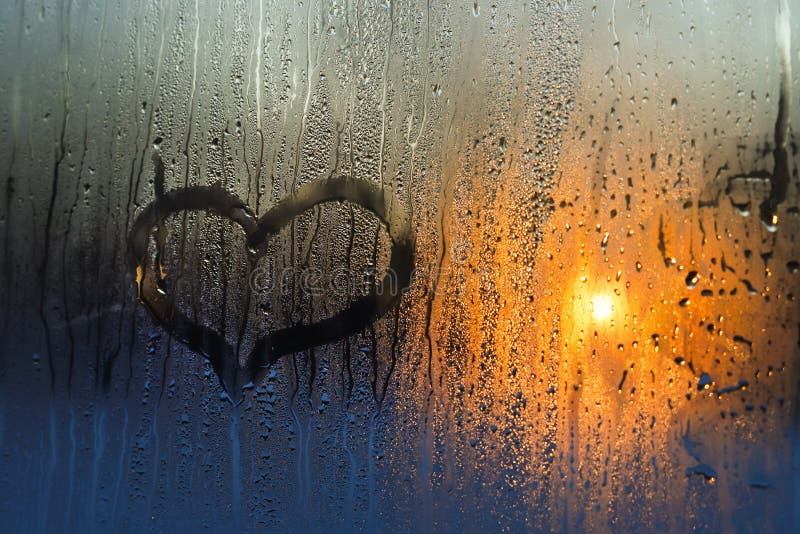 Heart Symbol on Wet Window, Sunlight Stock Image - Image of sunlight ...