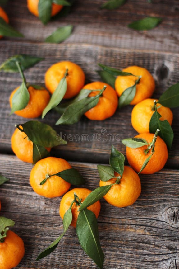 Heart of Tangerines with Leaves on the Table Stock Image - Image of ...