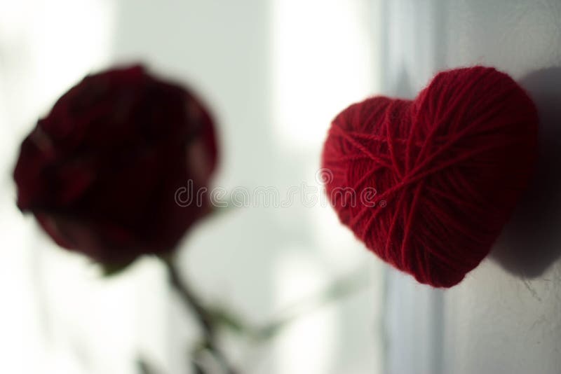 Heart of Threads Yarn on a Background of Red Roses Stock Image - Image ...