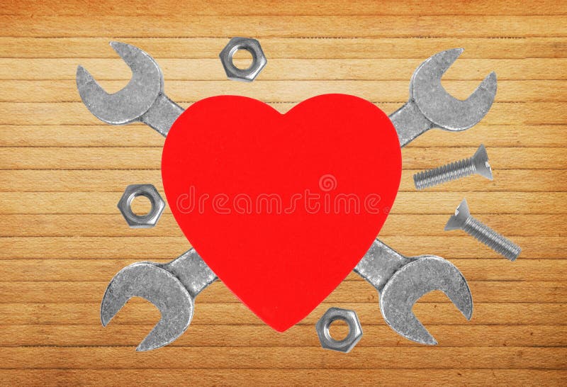 Heart and Tools. Concept: Renovation of Heart. Over Wooden Background ...