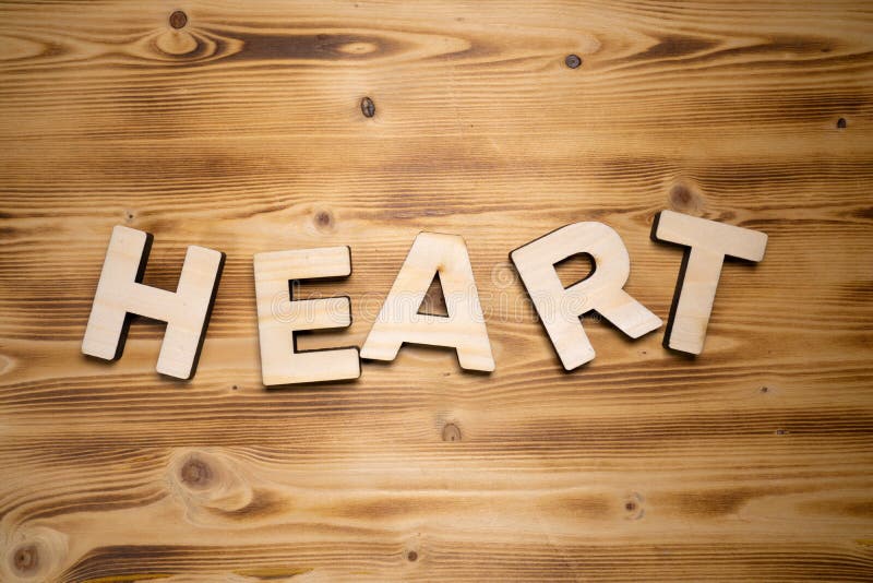 HEART Word Made with Building Blocks on Wooden Board Stock Photo ...