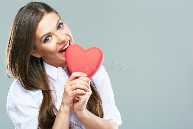 Beautiful Woman Bite Heart. Isolated Portrait Stock Image - Image of ...