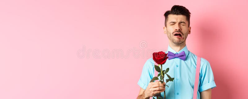 Heartbroken Guy In Funny Bow Tie Crying Over Girlfriend Standing Alone