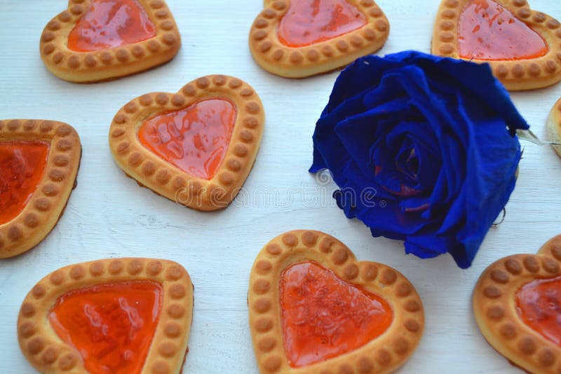Hearts Cookies Pattern Background with Blue Rose Stock Photo - Image of ...