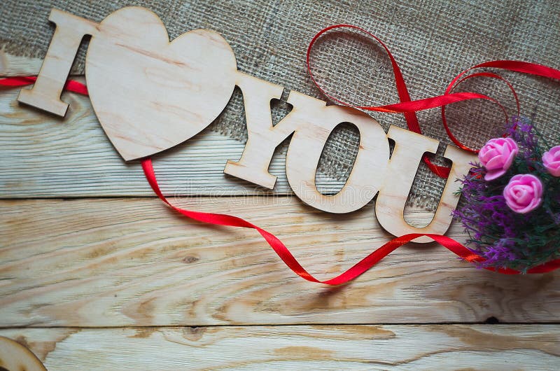 Hearts, Flowers, Ribbons on a Wooden Light Stock Photo - Image of ...
