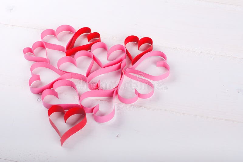 Hearts on a white board stock photo. Image of hanging - 68570828