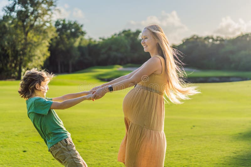 Heartwarming Outdoor Bonding As A Pregnant Mom And Her Son Enjoy