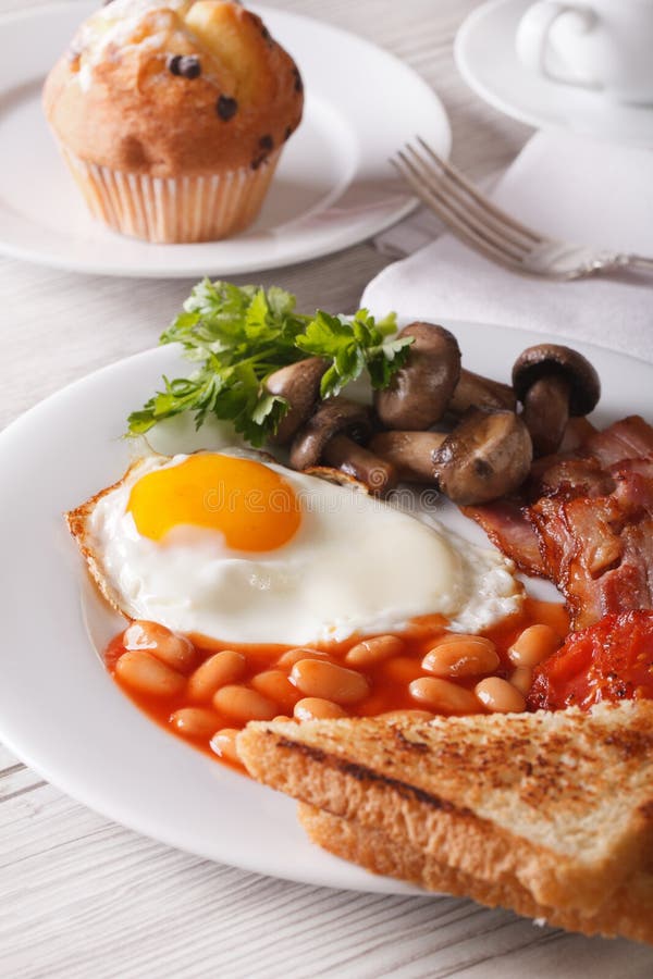 A Hearty English Breakfast Close-up on a Plate. Vertical Stock Image ...