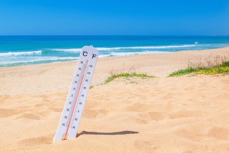 The Heat on the Beach. Thermometer for Temperature . Stock Photo ...