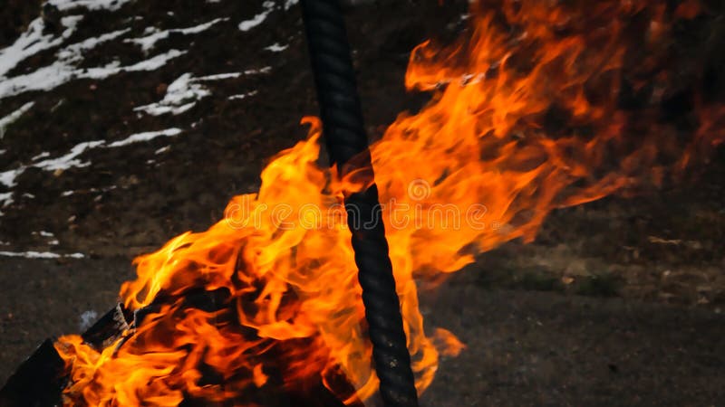 The Heat of the Fire Flames Melts the Snow Stock Photo - Image of fire ...