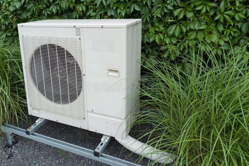 Heat Pump in Garden Surrounded by Greenery Stock Photo - Image of setup ...