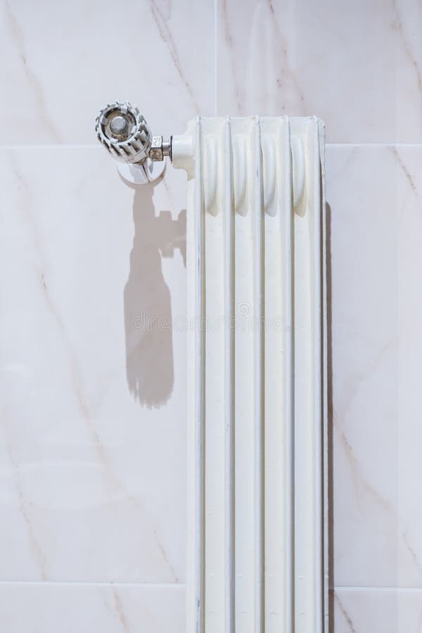 Heat radiator on wall stock image. Image of control - 112314399