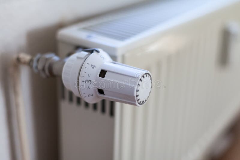 A Heat Regulator on a German Heater Stock Photo - Image of radiator ...