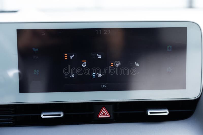 Heated Seat Dashboard in a Car. Steering Wheel Heating Button in the ...