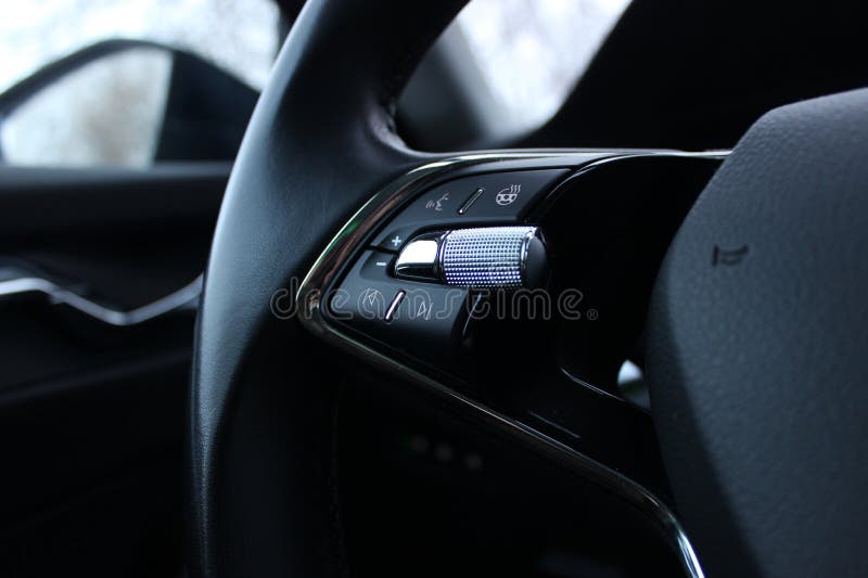 Electronic Mode Switch Buttons on the Multifunction Steering Wheel of a ...