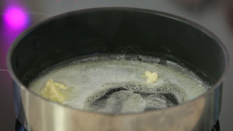 Melting Piece of Butter in a Steel Pan Stock Video - Video of kitchen ...