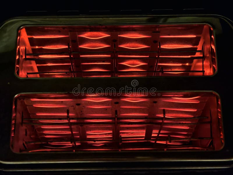 Heating Element Wires of a Bread Toaster Glowing Red Hot Stock Photo ...