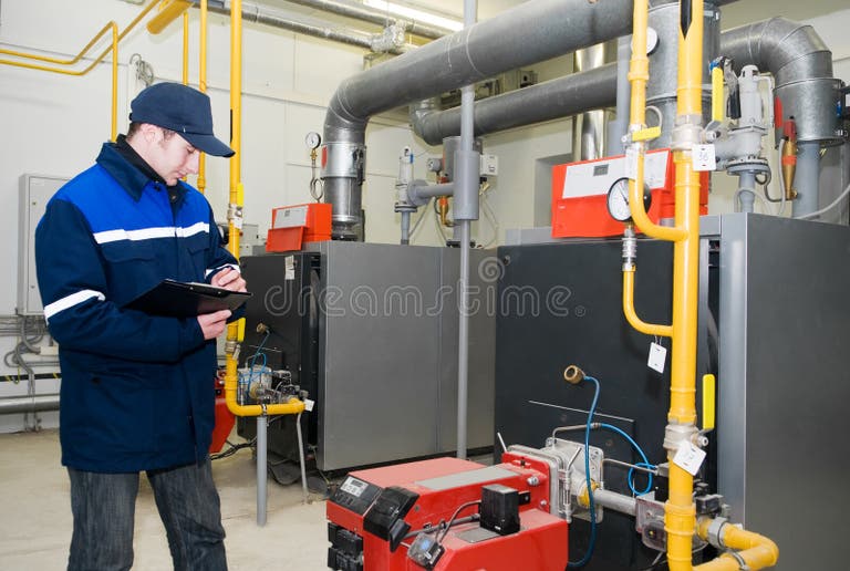 Heating Engineer in Boiler Room Stock Photo - Image of pipe, faucet ...