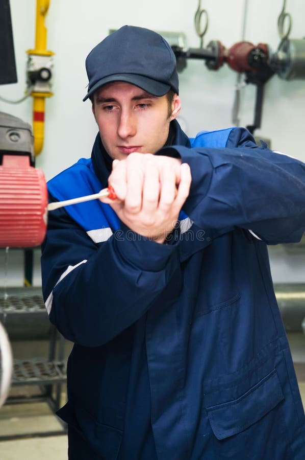 Heating Engineer in Boiler Room Stock Image - Image of examining ...