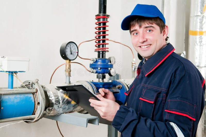 Heating engineer repairman stock image. Image of circulation - 20180163