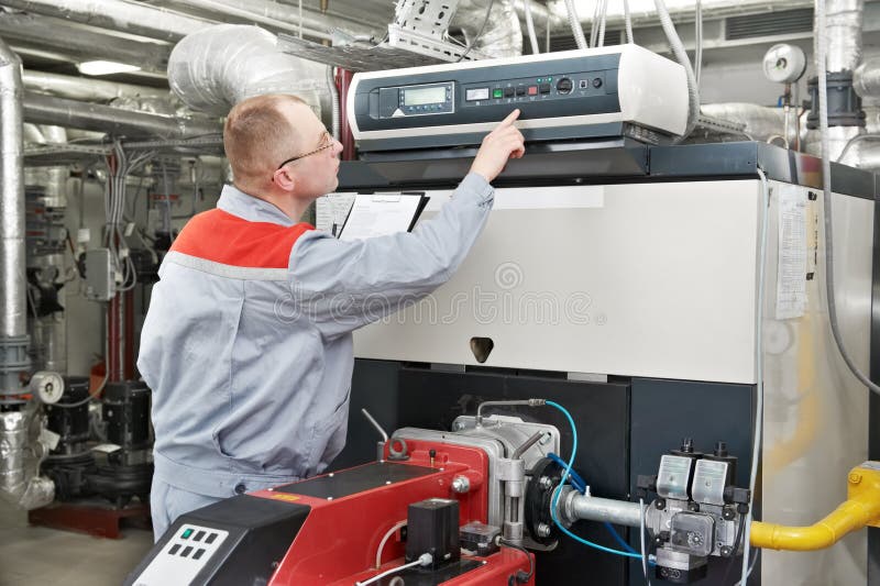 Heating Engineer Repairman in Boiler Room Stock Image - Image of ...