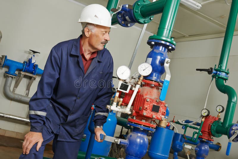 Heating Engineer Repairman in Boiler Room Stock Image - Image of ...