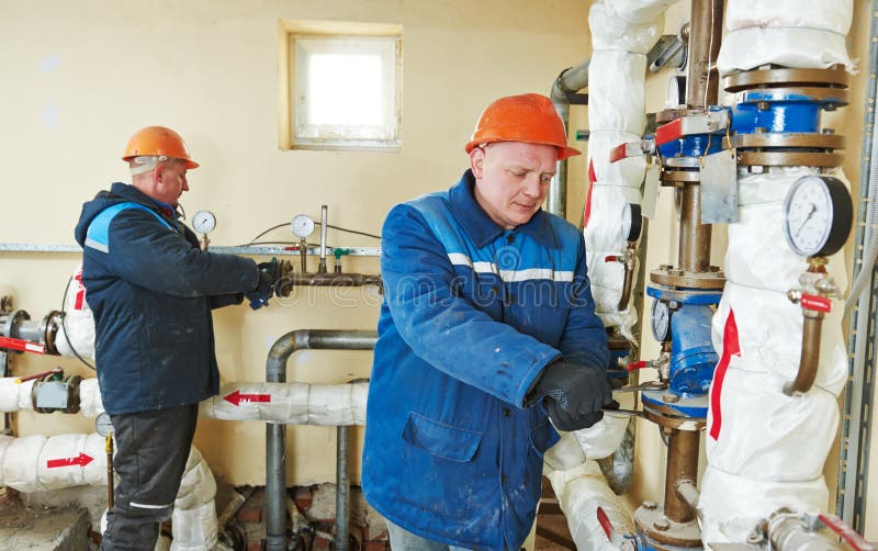 Heating Engineer Repairman in Boiler Room Stock Image - Image of ...