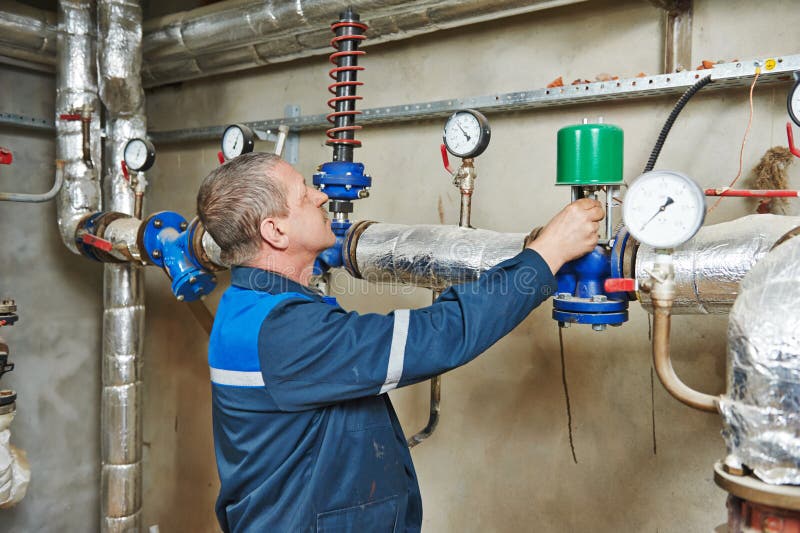 Heating Engineer Repairman in Boiler Room Stock Photo - Image of ...