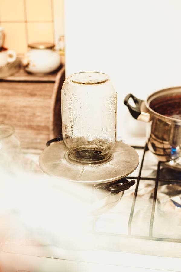 Heating Glass Jar for Jam Preservation on Gas Stove Stock Image - Image ...