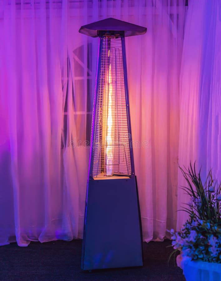Heating Lamp Heater Placed among the Tables of an Open Cafe Stock Photo ...