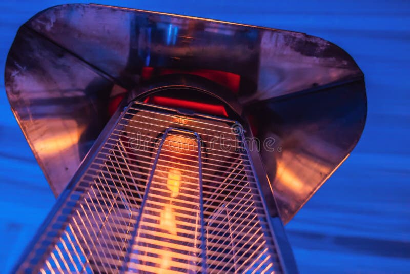 Heating Lamp Heater Placed among the Tables of an Open Cafe Stock Photo ...