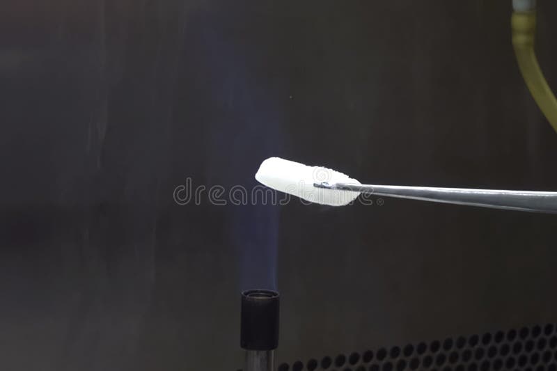 Heating Lump of Sugar on an Open Flame of a Gas Burner Stock Image ...