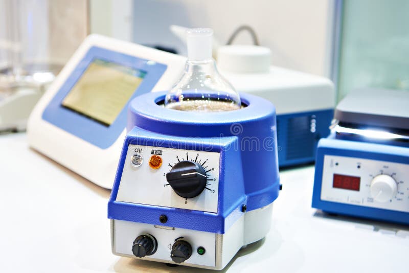 Heating mantle and flask stock photo. Image of scientific - 199651714