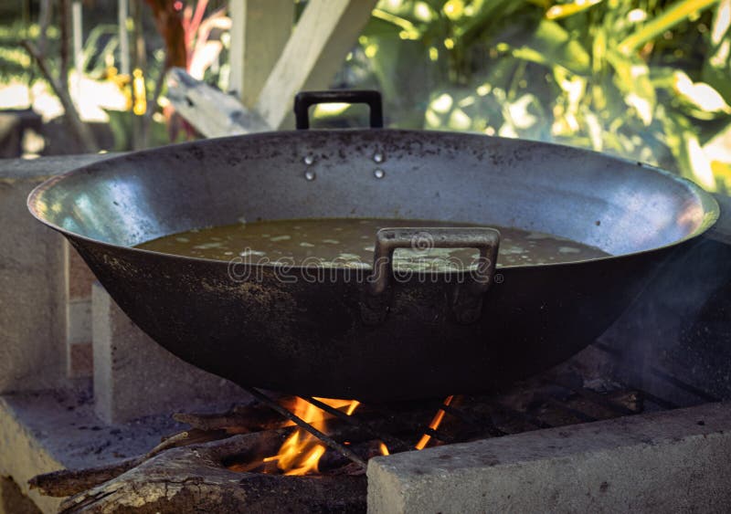 Heating Over an Open Fire of Water in a Large Cauldron! Stock Photo ...