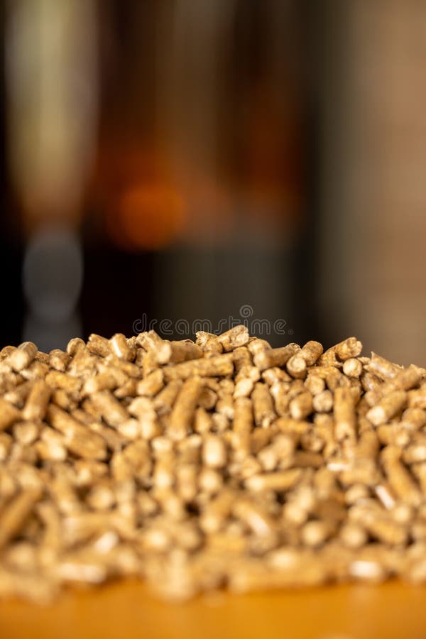 Heating pellets on a table stock image. Image of wood - 338702879