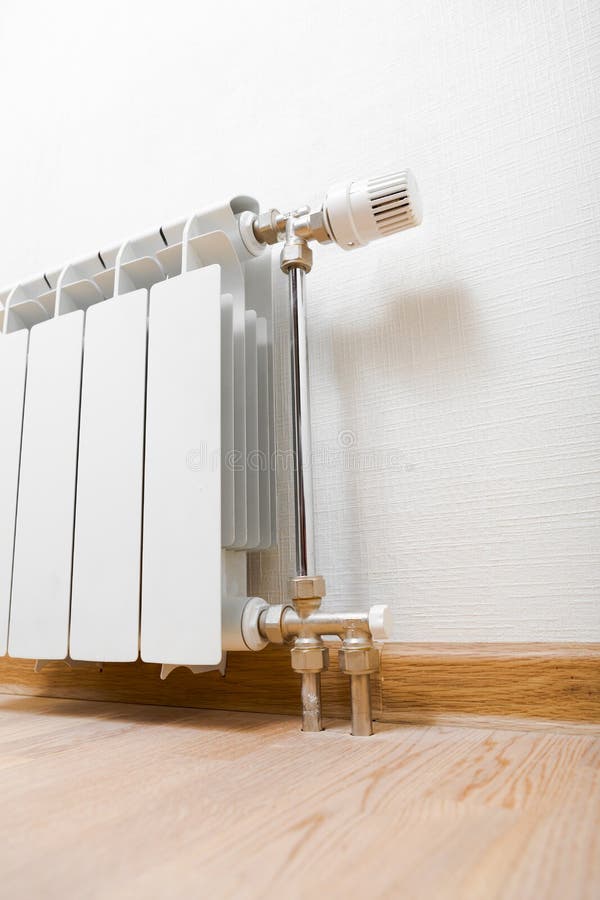 Heating radiator at home stock image. Image of metal - 51631225
