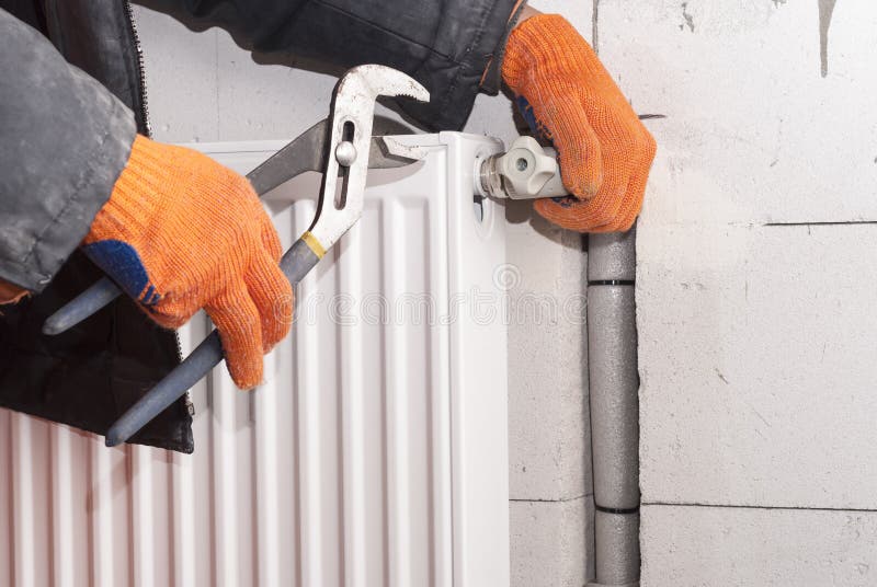 Heating Radiator Installation Stock Photo - Image of handyman, mechanic ...